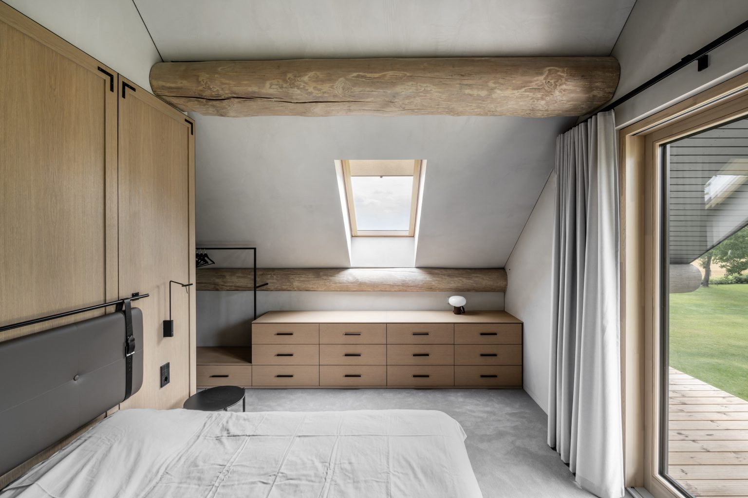 Turnstyle Designs Crafting harmony in unique log house interior ...