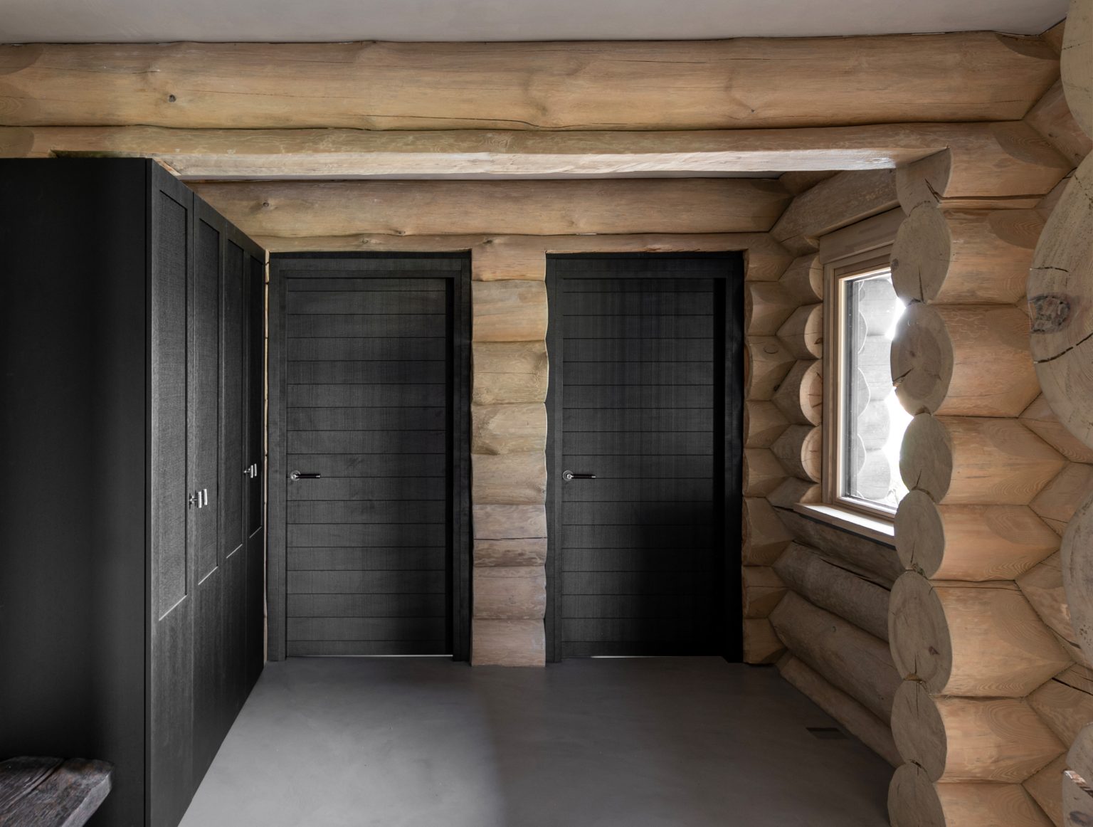 Turnstyle Designs Crafting harmony in unique log house interior ...